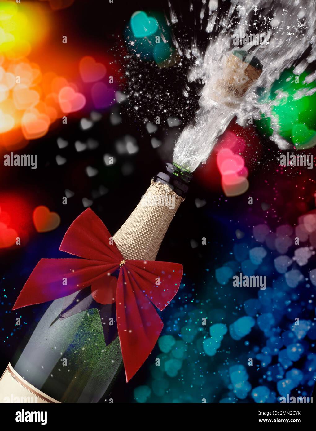 cork exploding from champagne bottle with bokeh hearts and stars Stock ...
