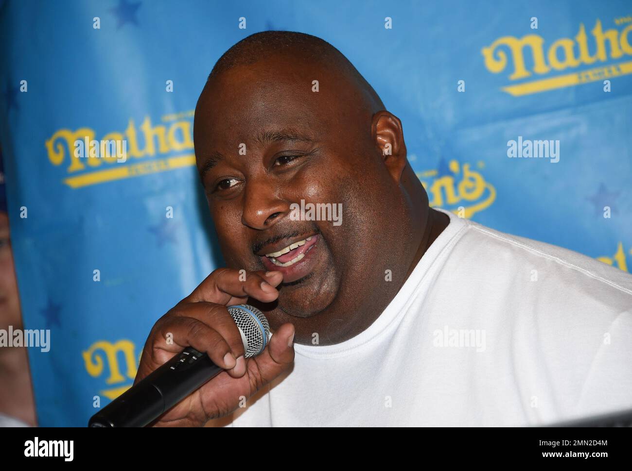 Competitive eater and rapper Eric "Badlands" Booker participates in ...