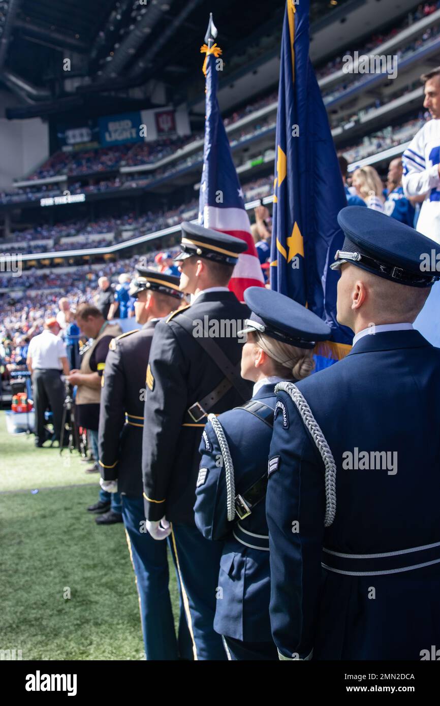Indiana National Guard soldiers and airmen await the opening ceremony ...