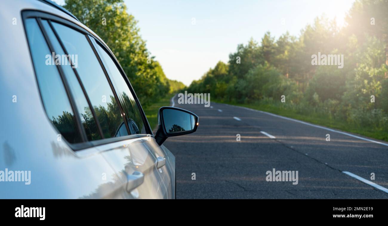 Car driving on a summer road Stock Photo - Alamy