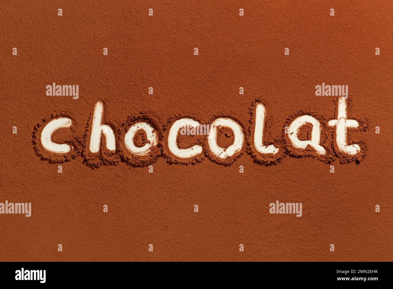 texture of raw cocoa powder labeled chocolate Stock Photo - Alamy