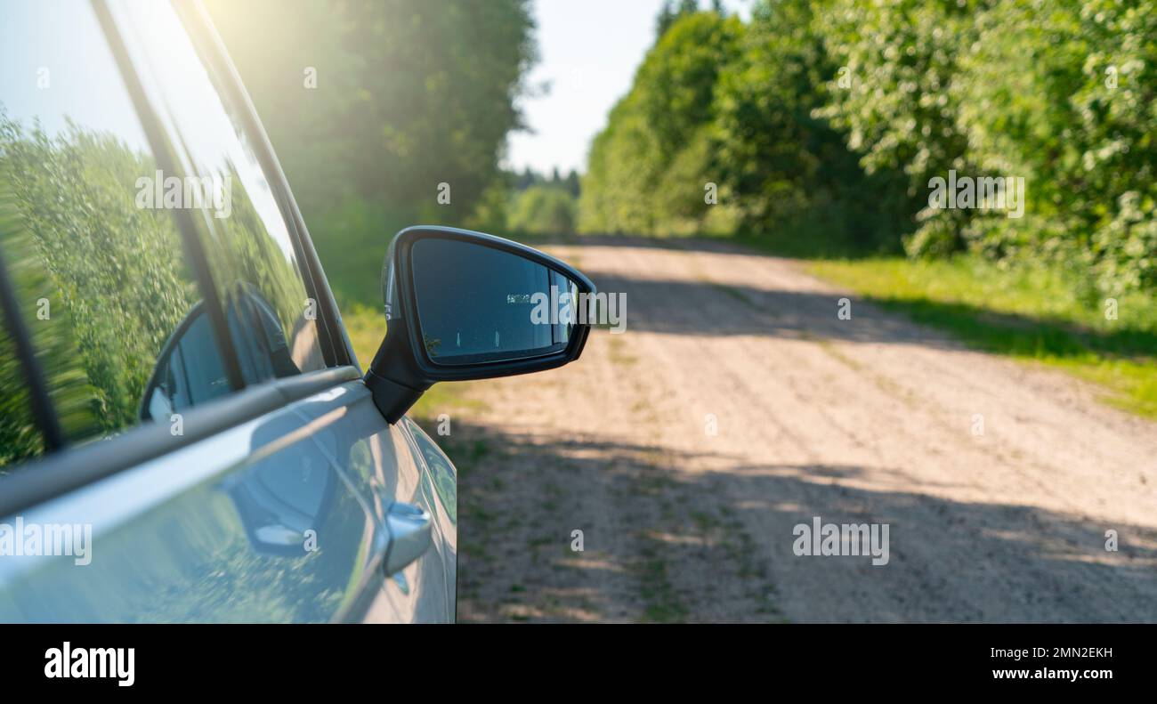 Car driving on a summer road Stock Photo - Alamy