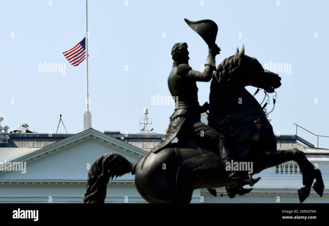 The flag of the United States flies at half-staff over the White House ...