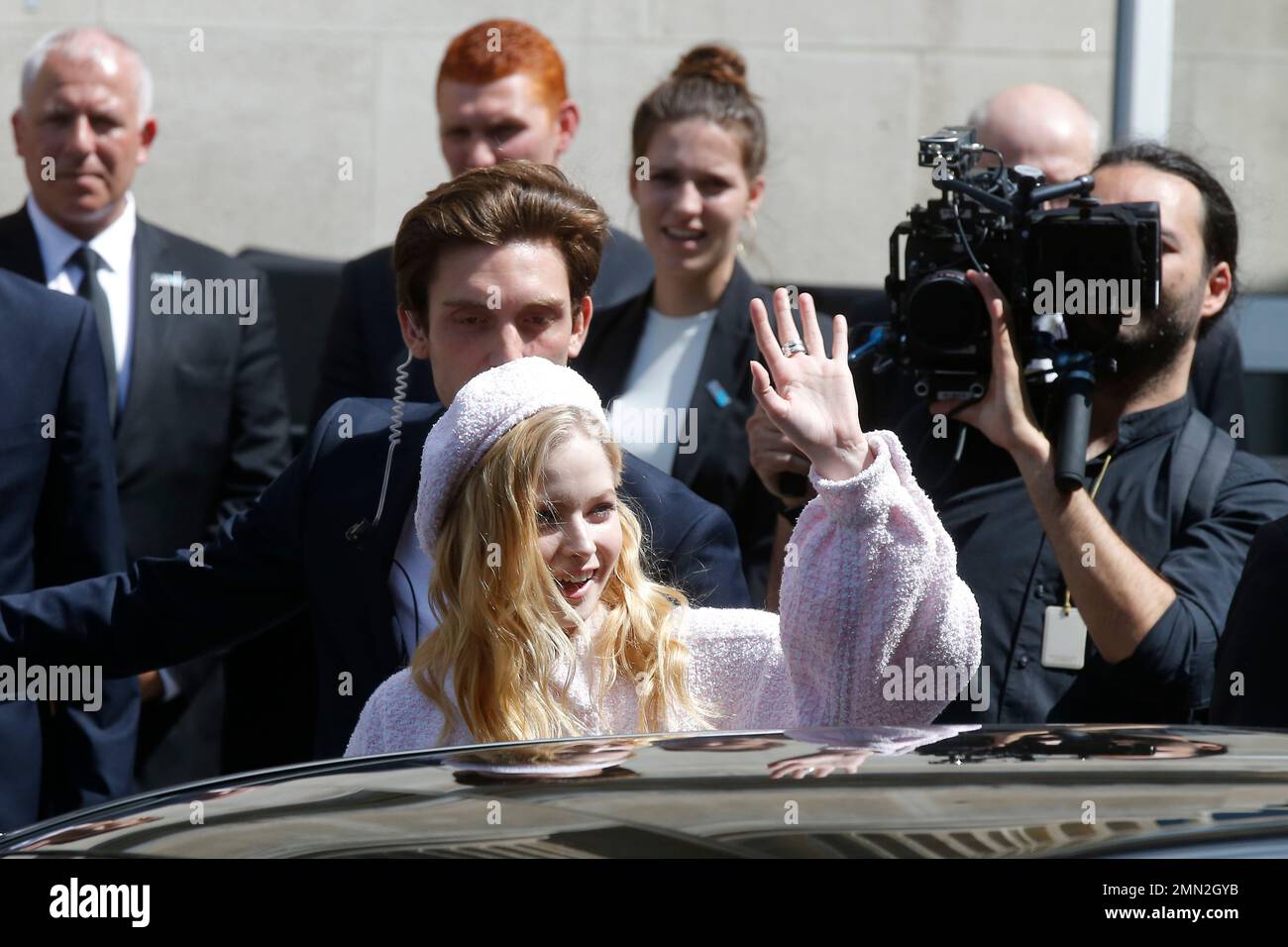 British actress Ellie Bamber waves as she arrives to Chanel Haute ...