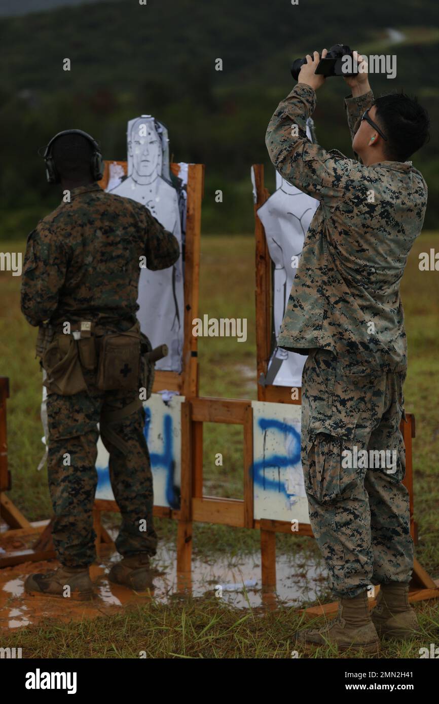 U.S. Marine Corps Lance Cpl. Thomas Sheng, a combat photographer with ...