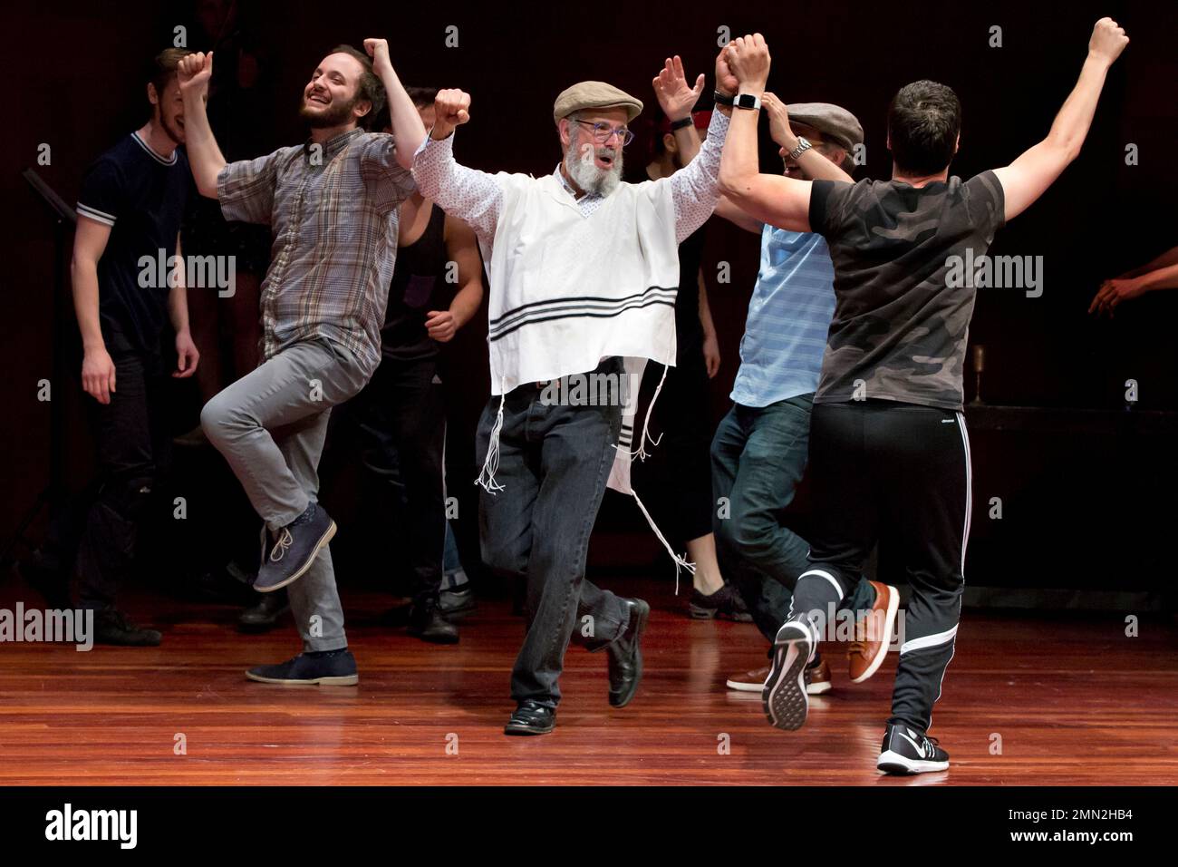 In this Tuesday, June 19, 2018, photo, Steven Skybell, center, as Tevye ...