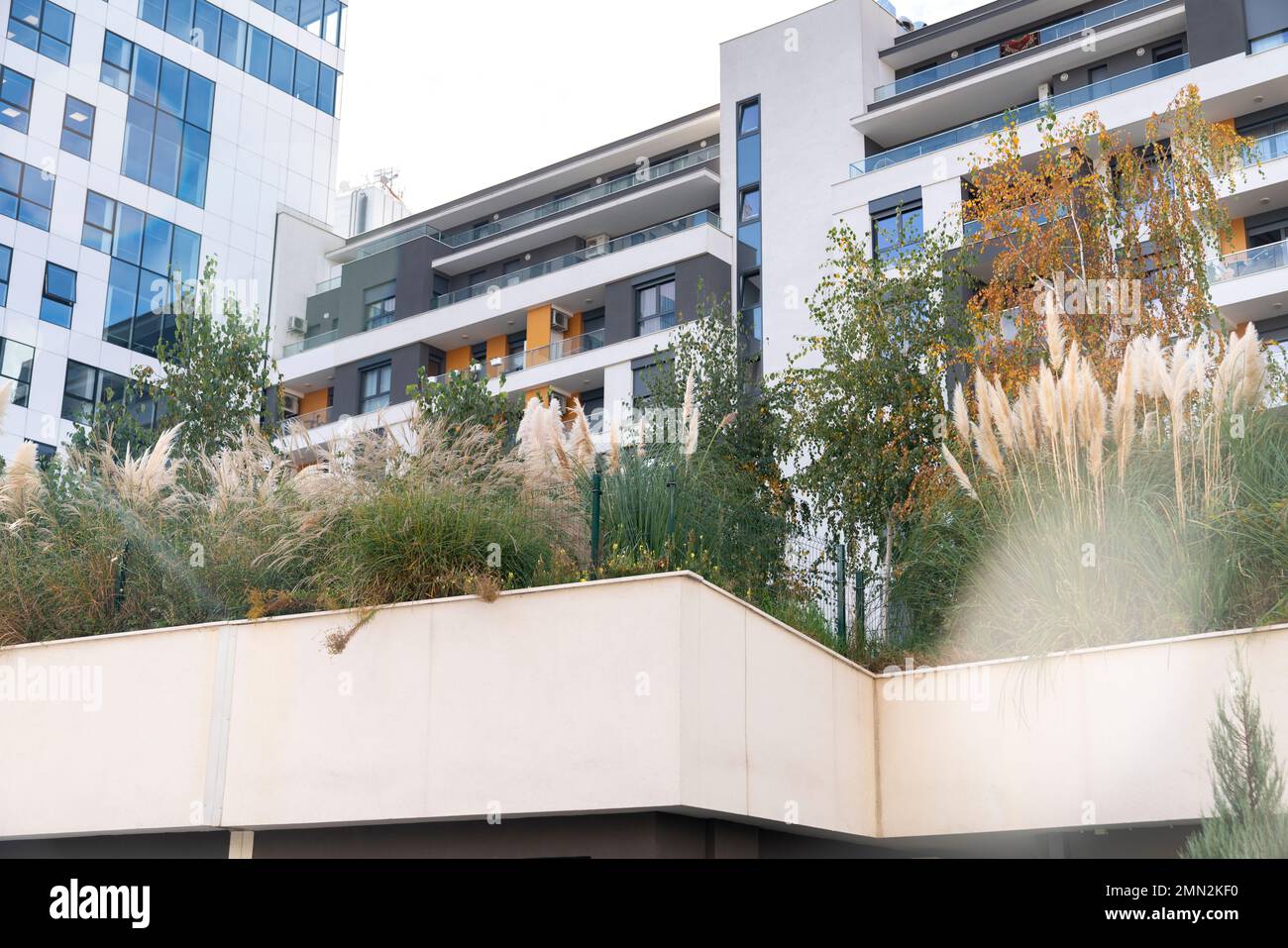 Modern glass buildings with terraced gardens Stock Photo - Alamy