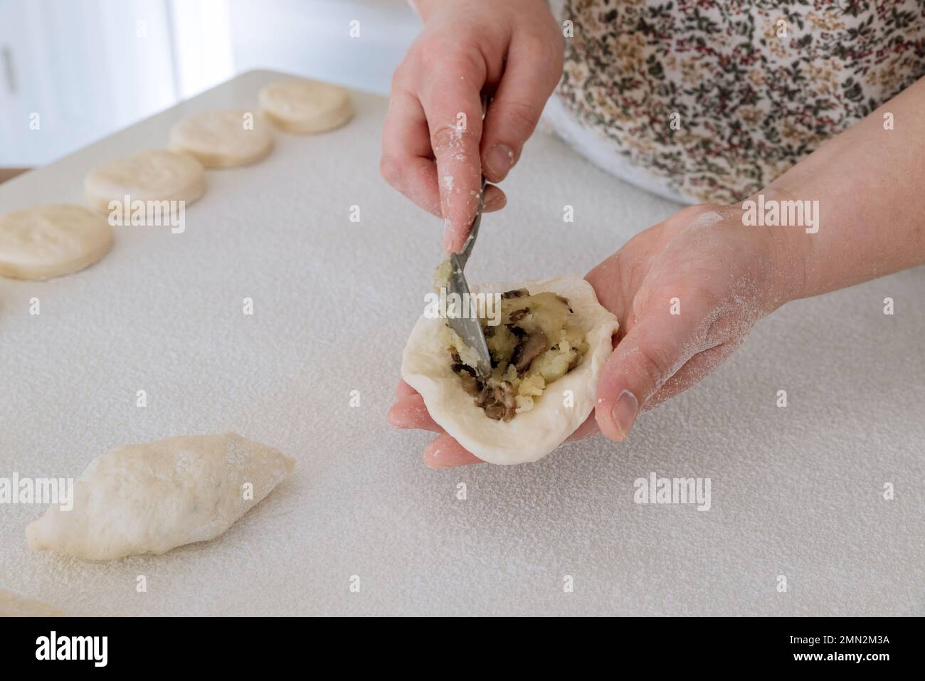 Making buns hi-res stock photography and images - Alamy
