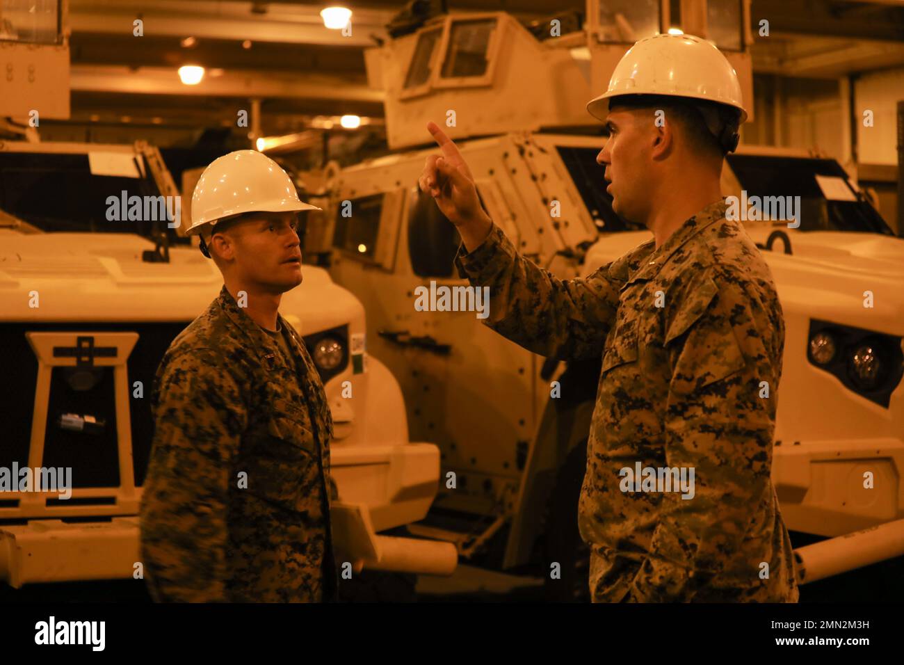 U.S. Marines Corps Chief Warrant Officer 2 Jamus Jones, right, a ...