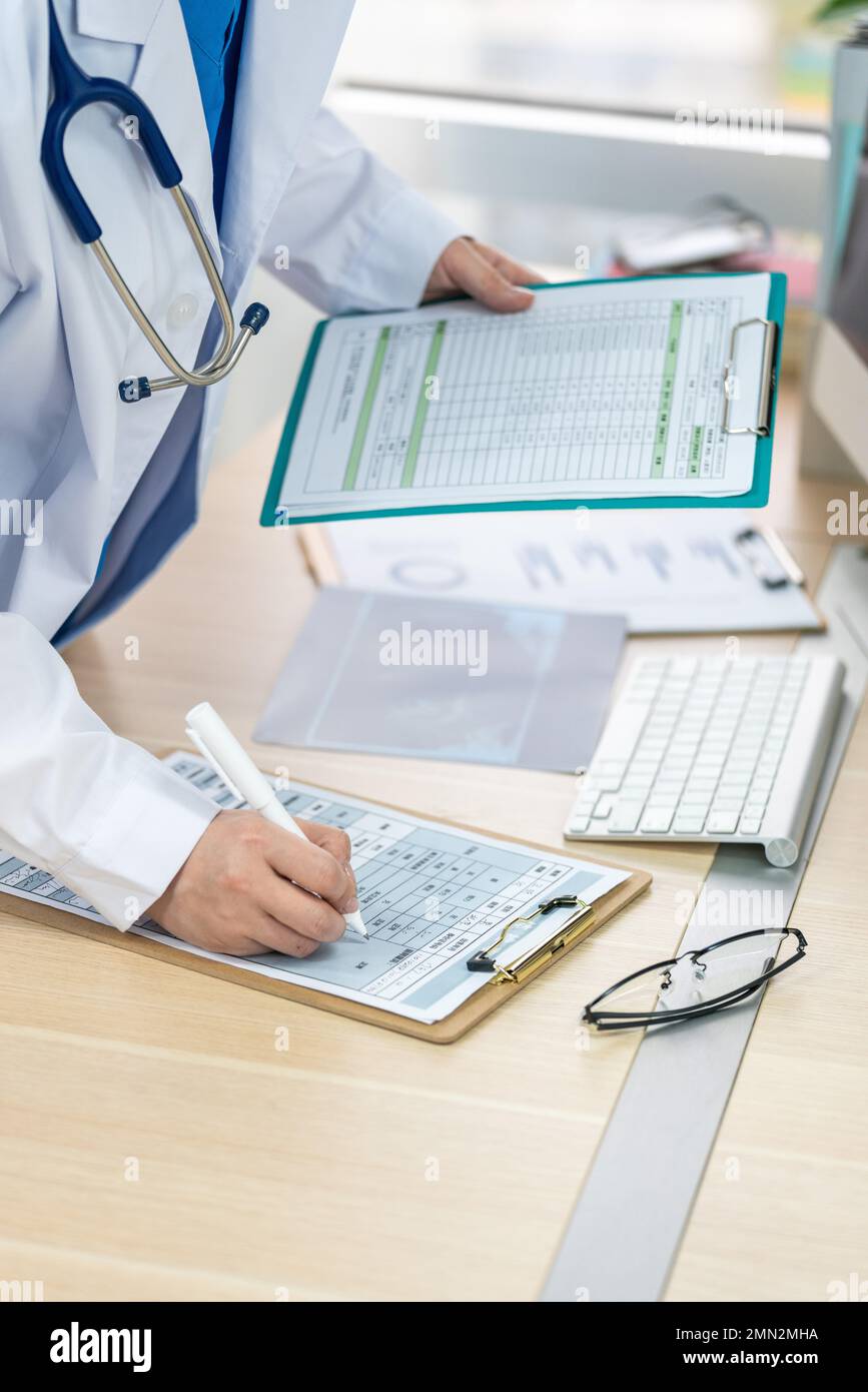 Case report the doctor Stock Photo - Alamy