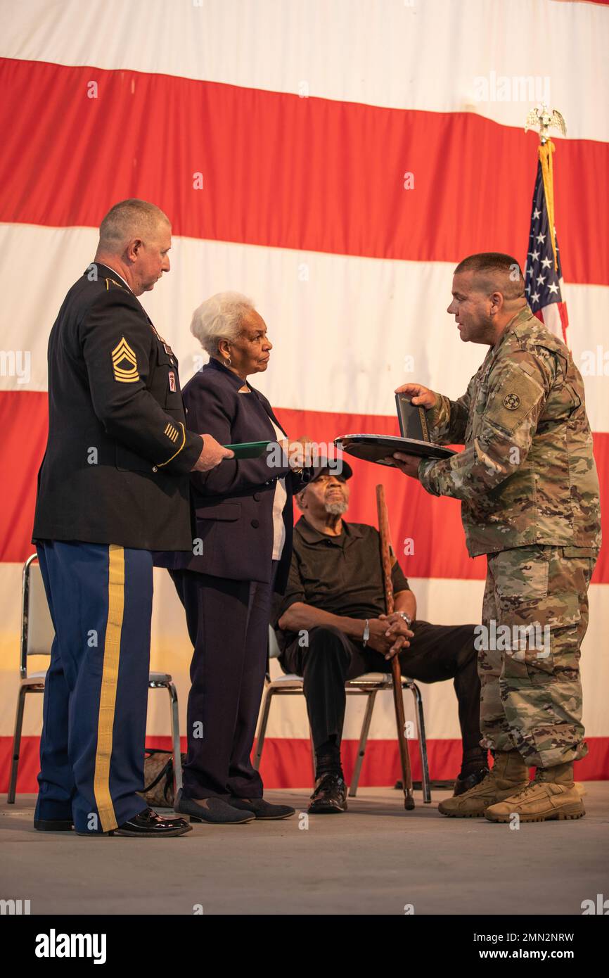 Lt. Col. Blake Quick presents Sheila Seaberry the Soldier's Medal on ...