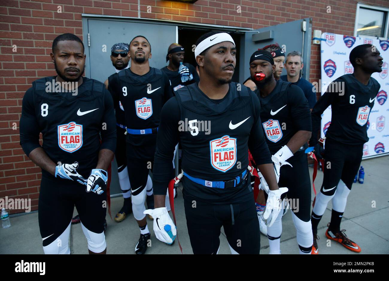 The Money Team steps out of the locker room area during the American ...