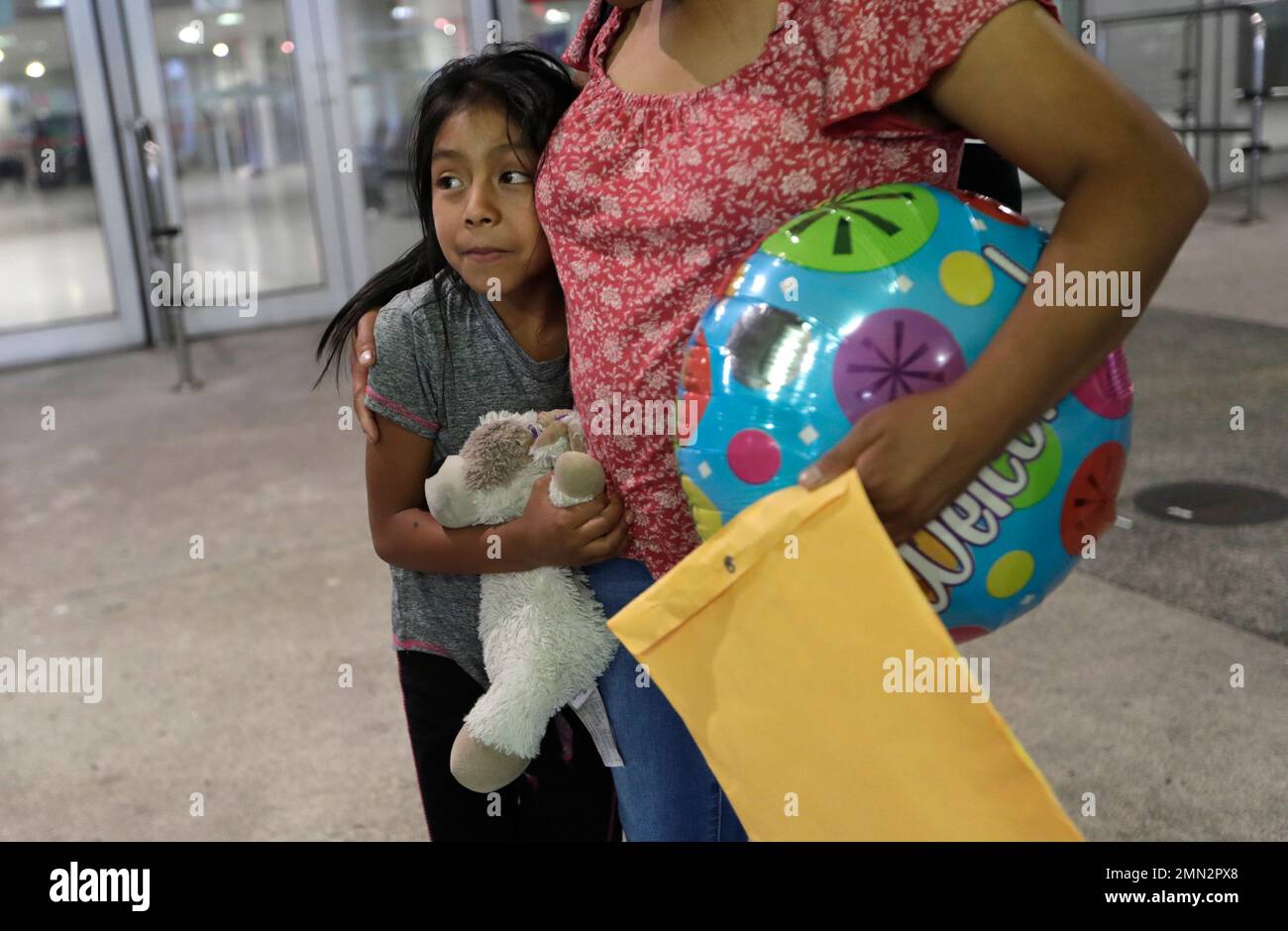 Buena Ventura Martin Godinez, right, stands with her daughter Janne ...