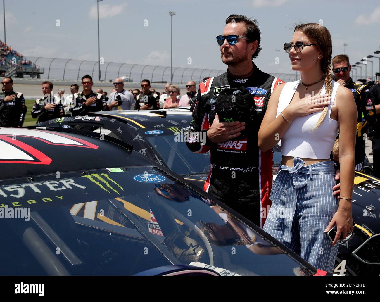 Kurt Busch and his wife Eva Busch stands during the national anthem ...