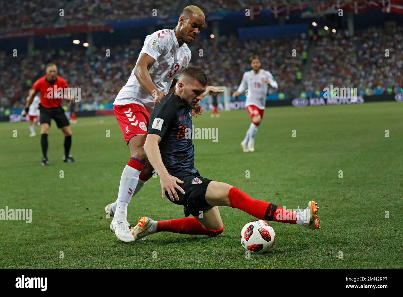 Denmark's Mathias Jorgensen, left, vies for the ball with Croatia's ...