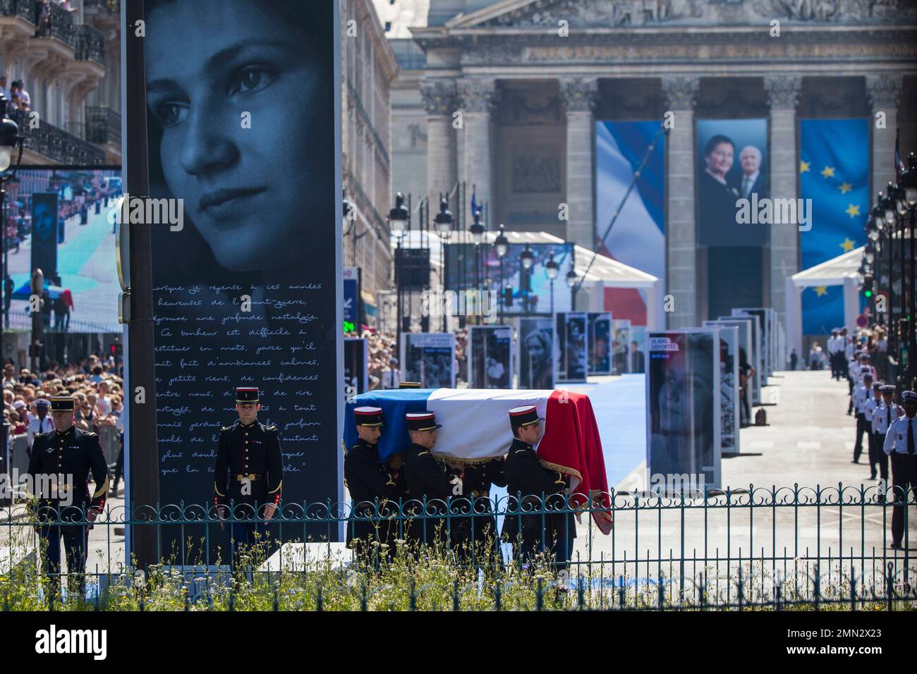 The flag-draped coffin of late Auschwitz survivor French health ...