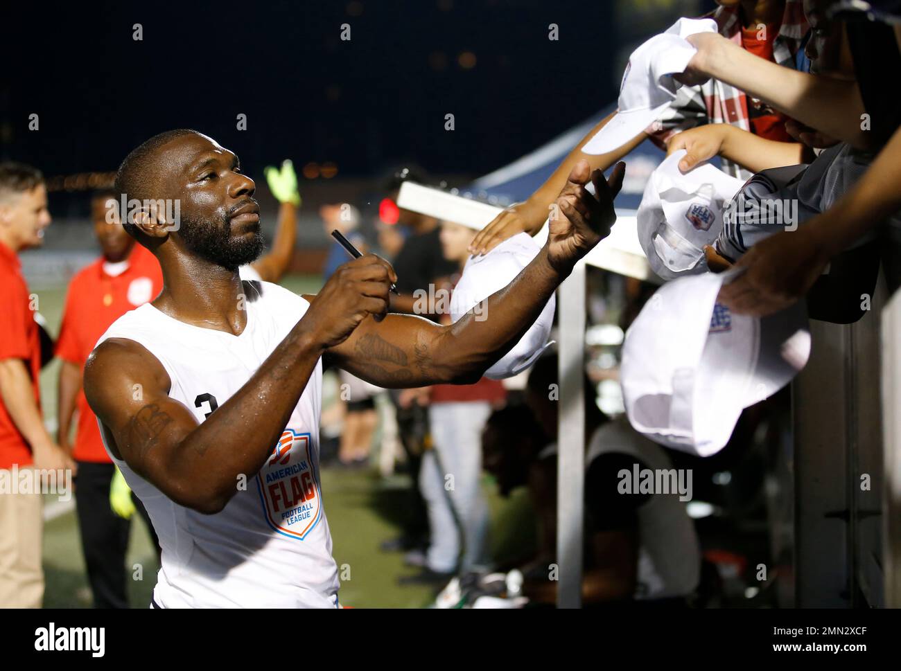 Fighting Cancer's Brandon McCray signs autographs following his team's ...