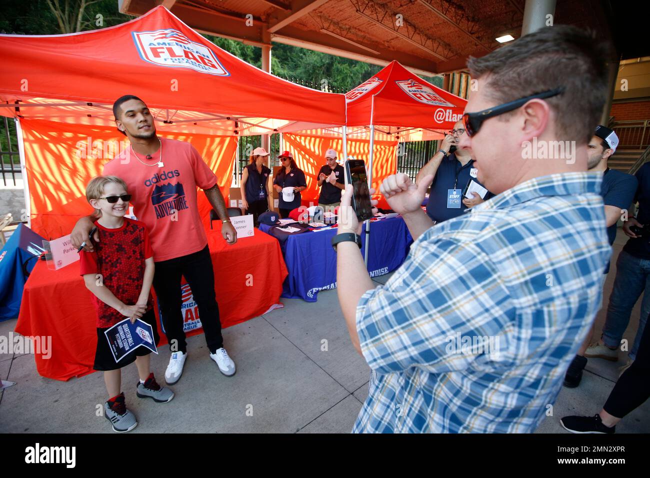 Pittsburgh Steelers James Conner poses with fans during the American ...