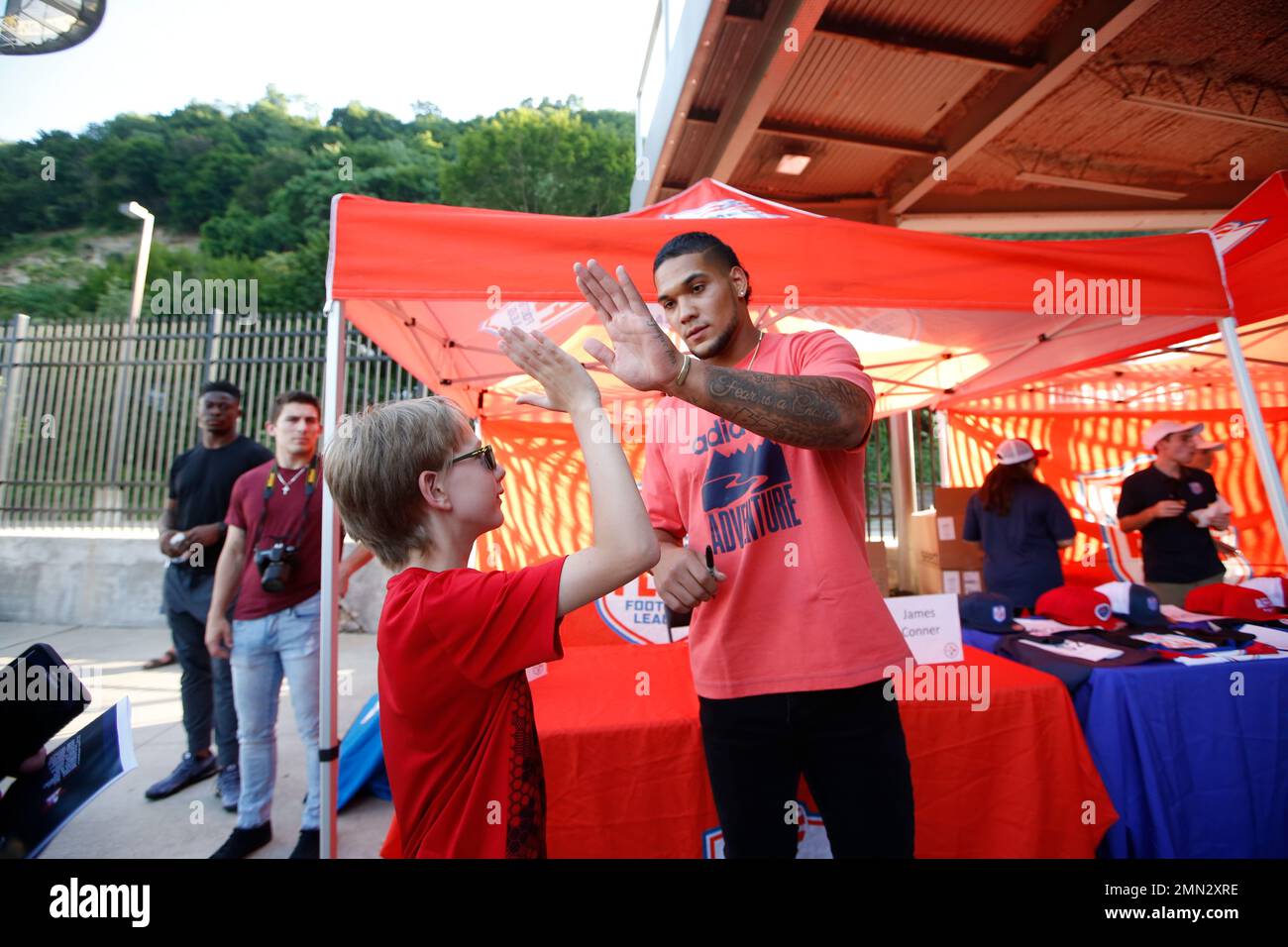 Pittsburgh Steelers James Conner poses with fans during the American ...