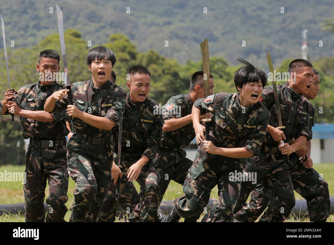 Chinese soldiers based in Hong Kong demonstrate their skill at the Shek ...