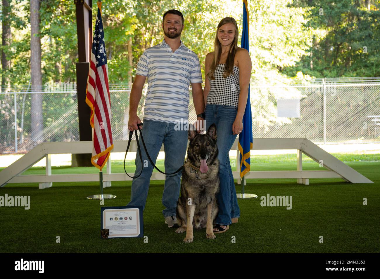 MWD Miko, Nick Armstrong, Miko’s former handler, and Megan McKinney ...