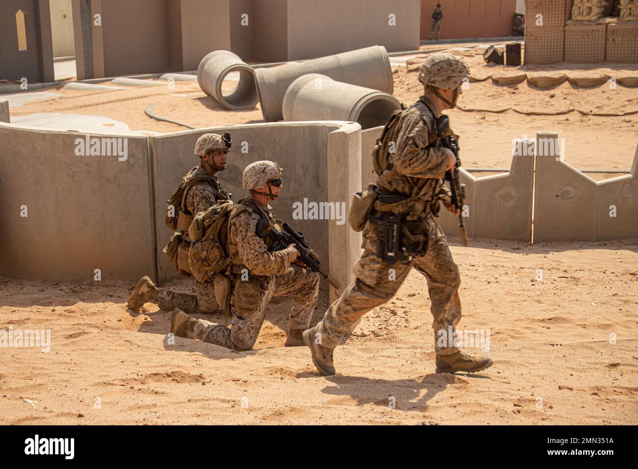 U.S. Marines with India Company, 3rd Battalion, 5th Marine Regiment,rehearse fire and maneuver ...