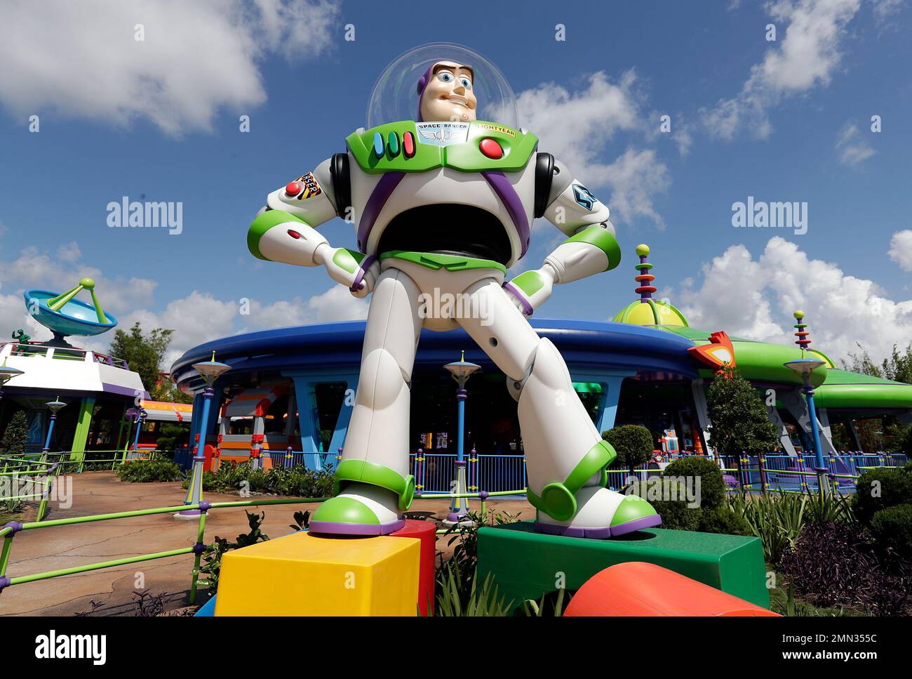 In this Saturday, June 23, 2018 photo, Buzz Lightyear stand near the ...