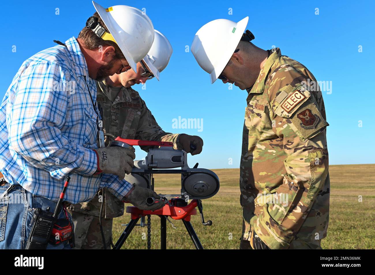 U.S. Air Force Airmen and civilians with the 509th Civil Engineering ...