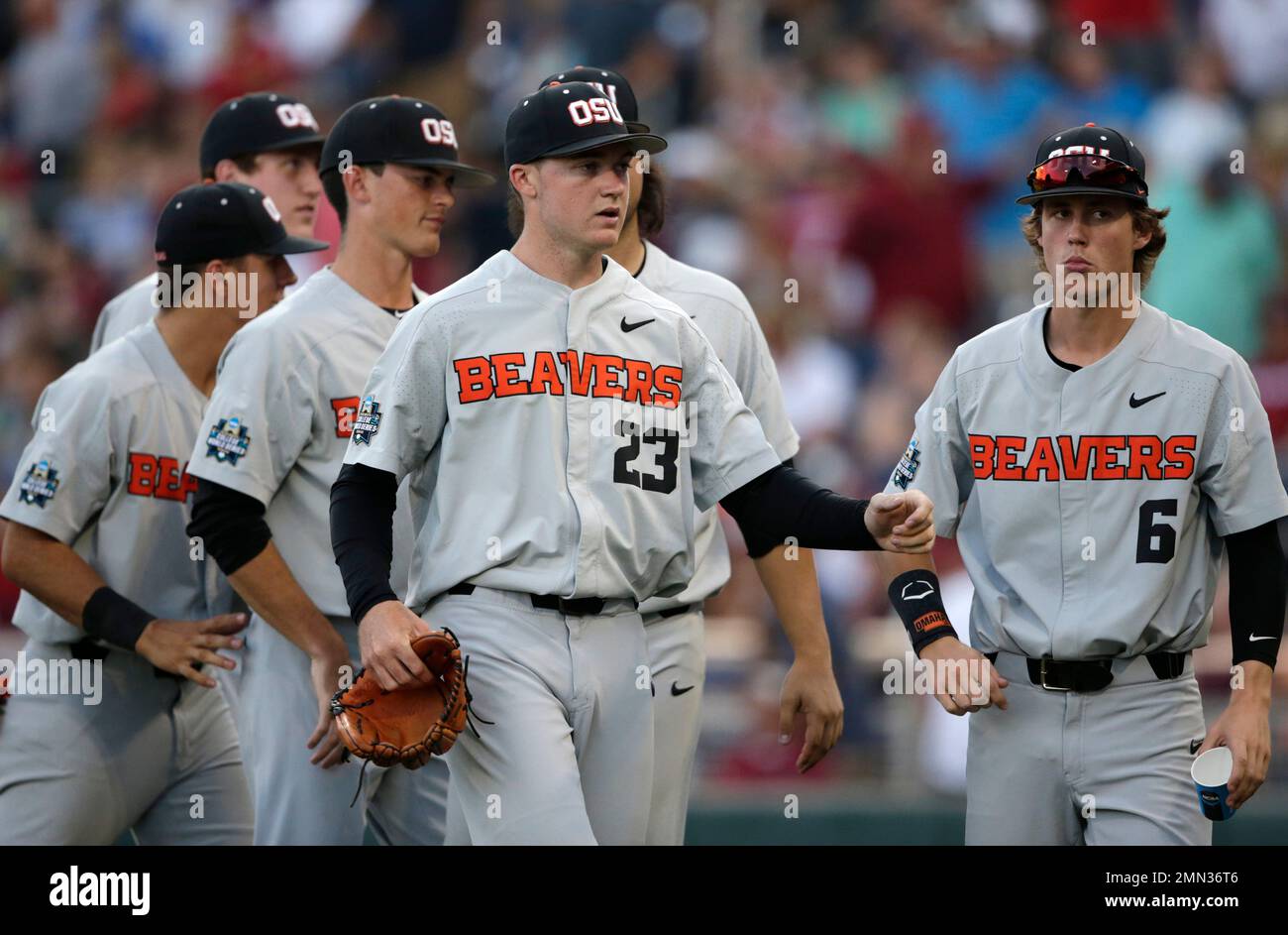 Oregon State pitcher Kevin Abel (23) walks off the field following the ...