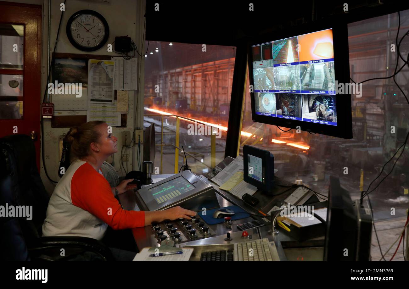 Steelworker Amanda Menendez keeps watch over various stages of the ...