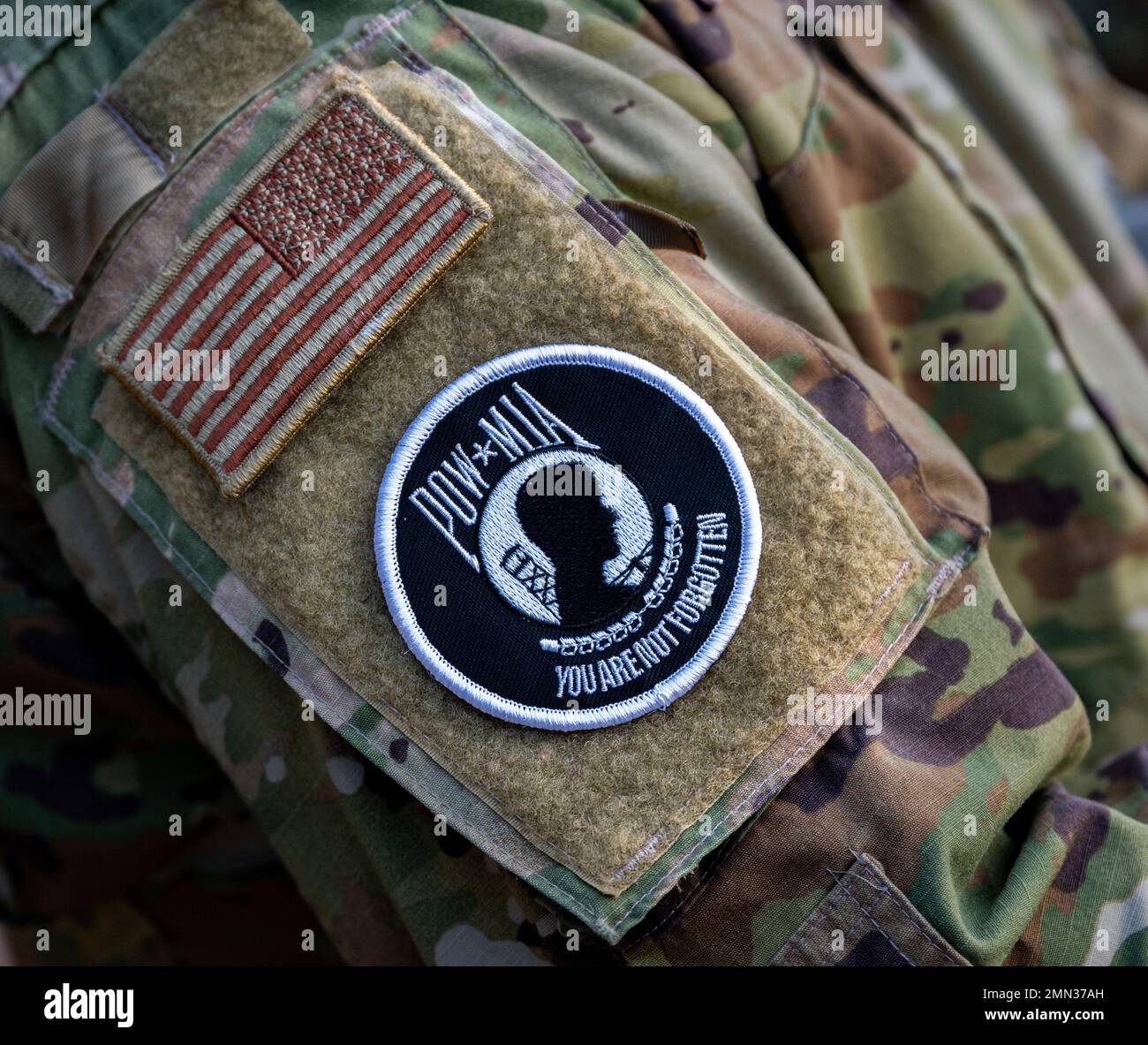 A prisoner of war and missing in action (POW/MIA) patch is affixed on the arm of Master Sgt ...