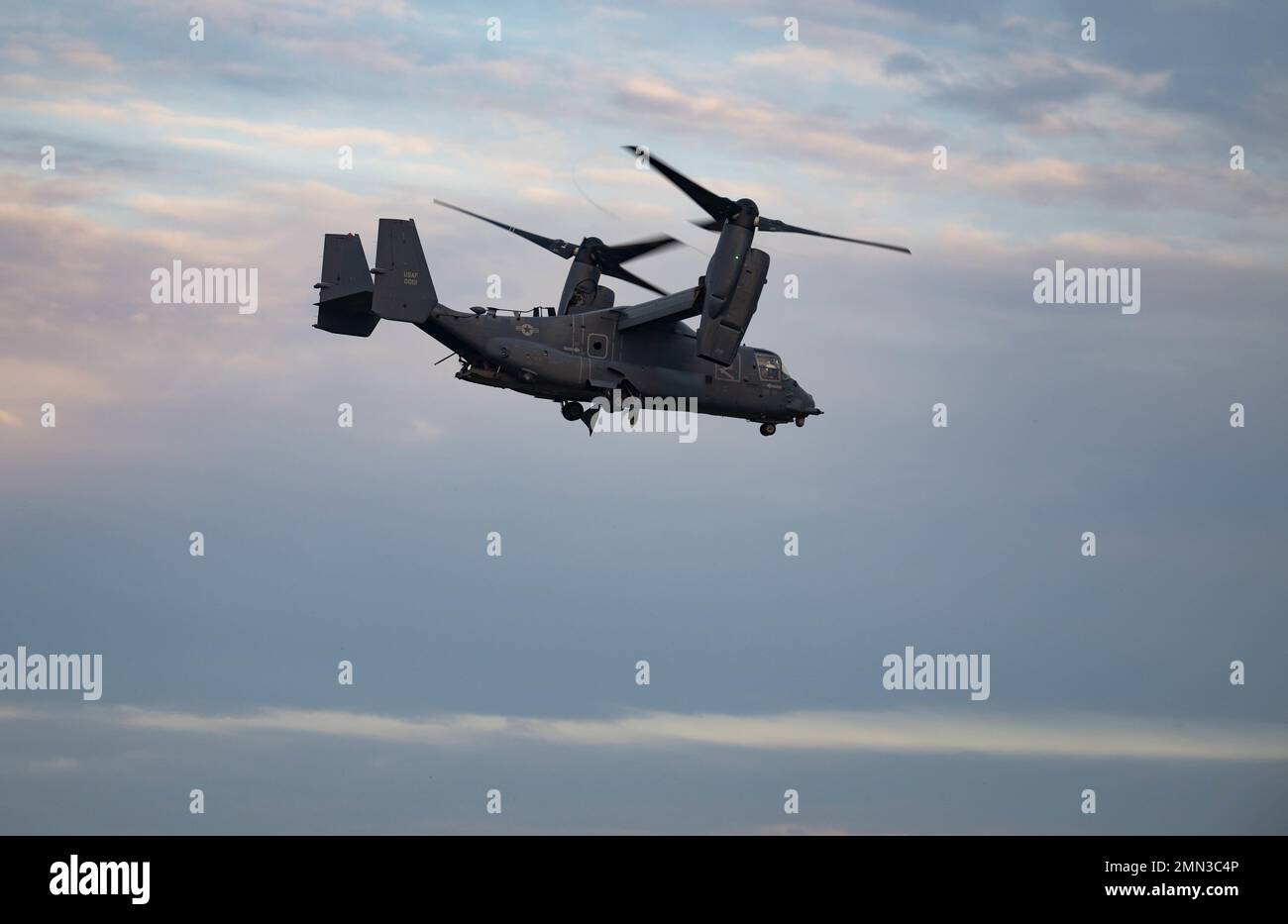 A CV-22 Osprey flies through the sky at Kunsan Air Base, Republic of ...