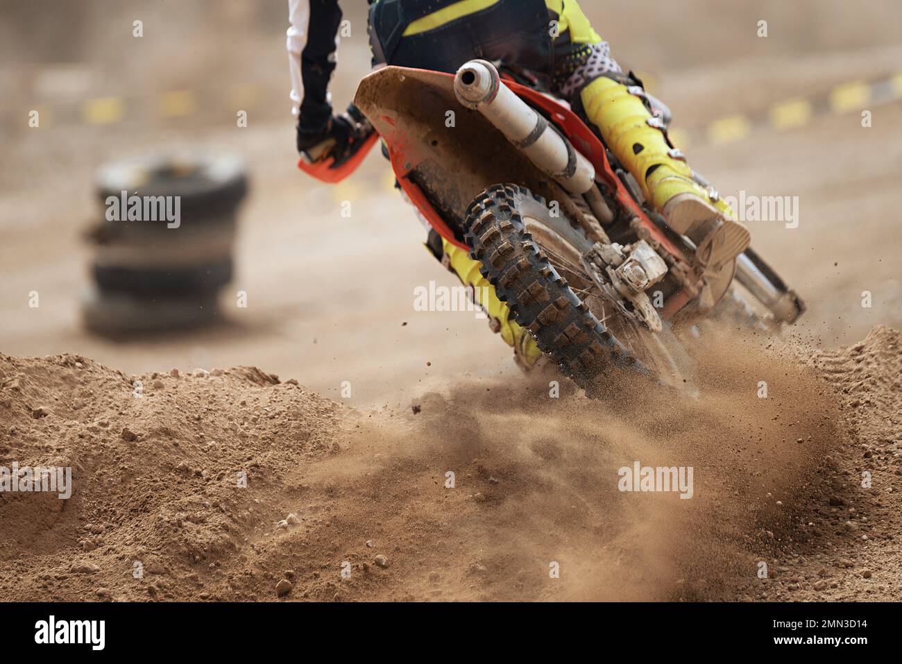 Rider driving in the motocross race the rear wheel motocross bike Stock ...