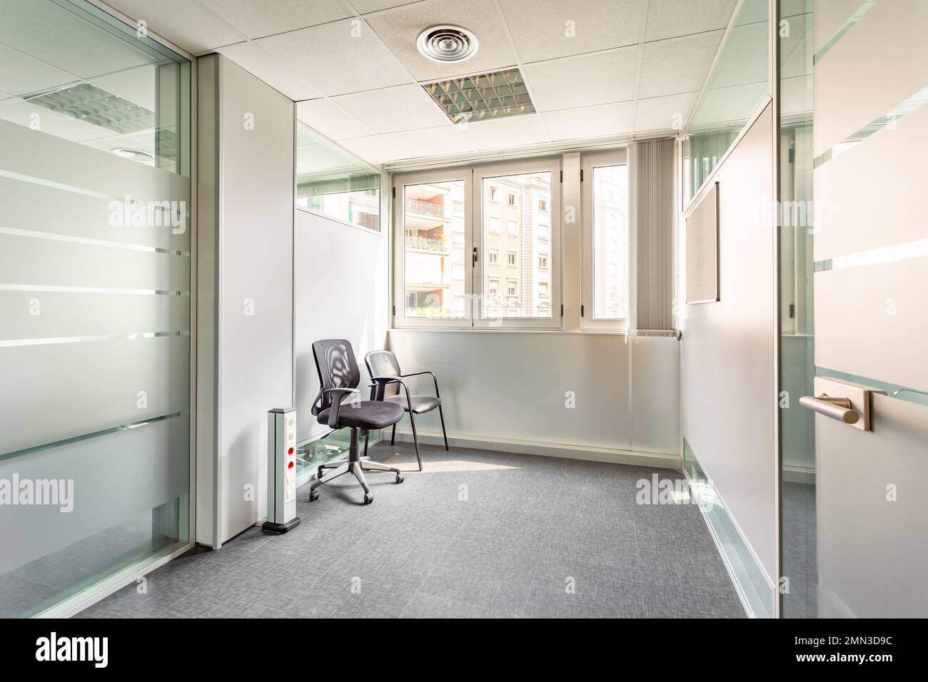 Interior of a white-gray corridor in a simple and office style. Two ...