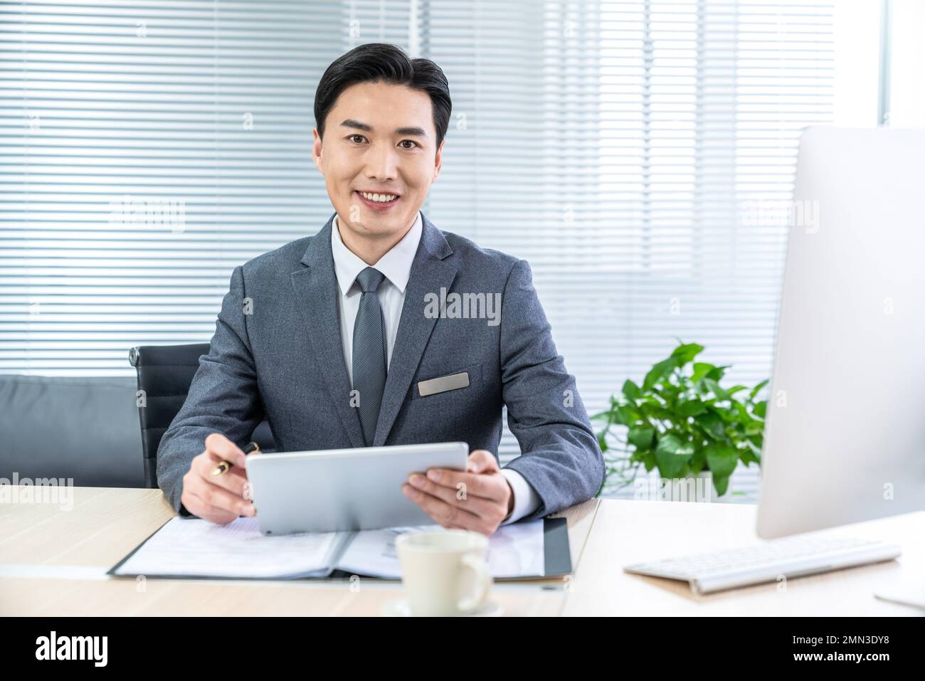 A young business man Stock Photo - Alamy