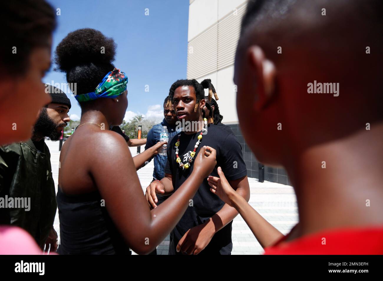 Rapper Denzel Curry greets fans before he enters the memorial for slain ...