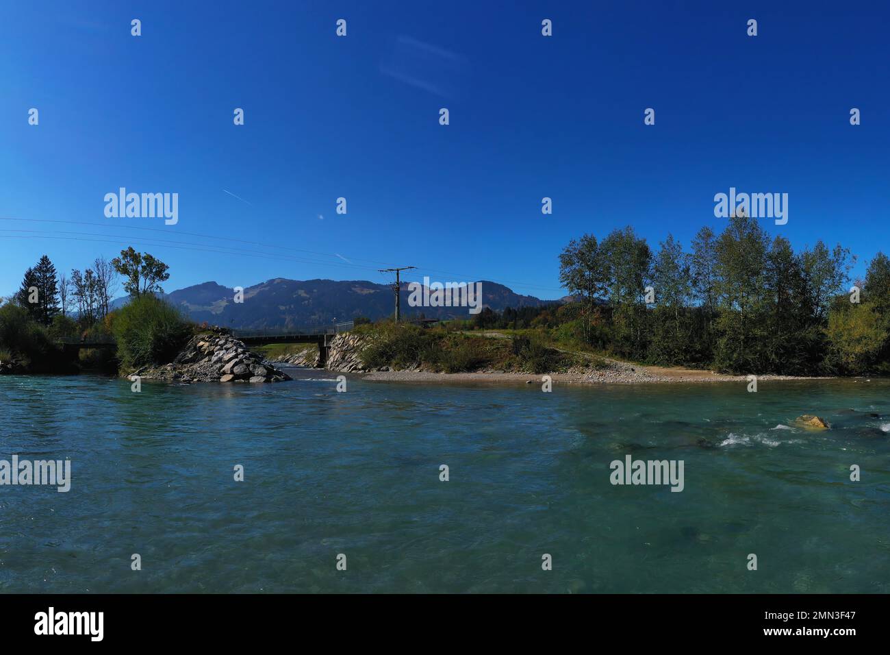 Aerial View Of Fischen In Allgäu With View Of Iller River. Confluence ...