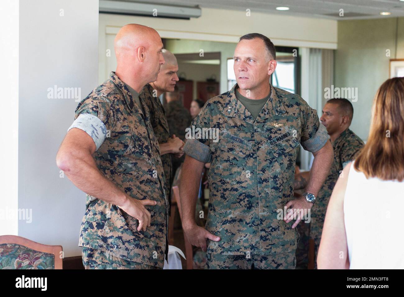 U.S. Marine Corps Maj. Gen. Eric Austin, center, commanding general ...