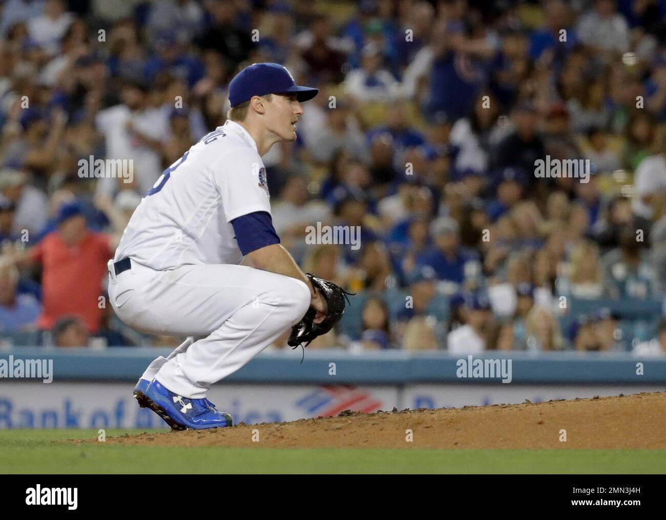 Los Angeles Dodgers starting pitcher Ross Stripling reacts after ...