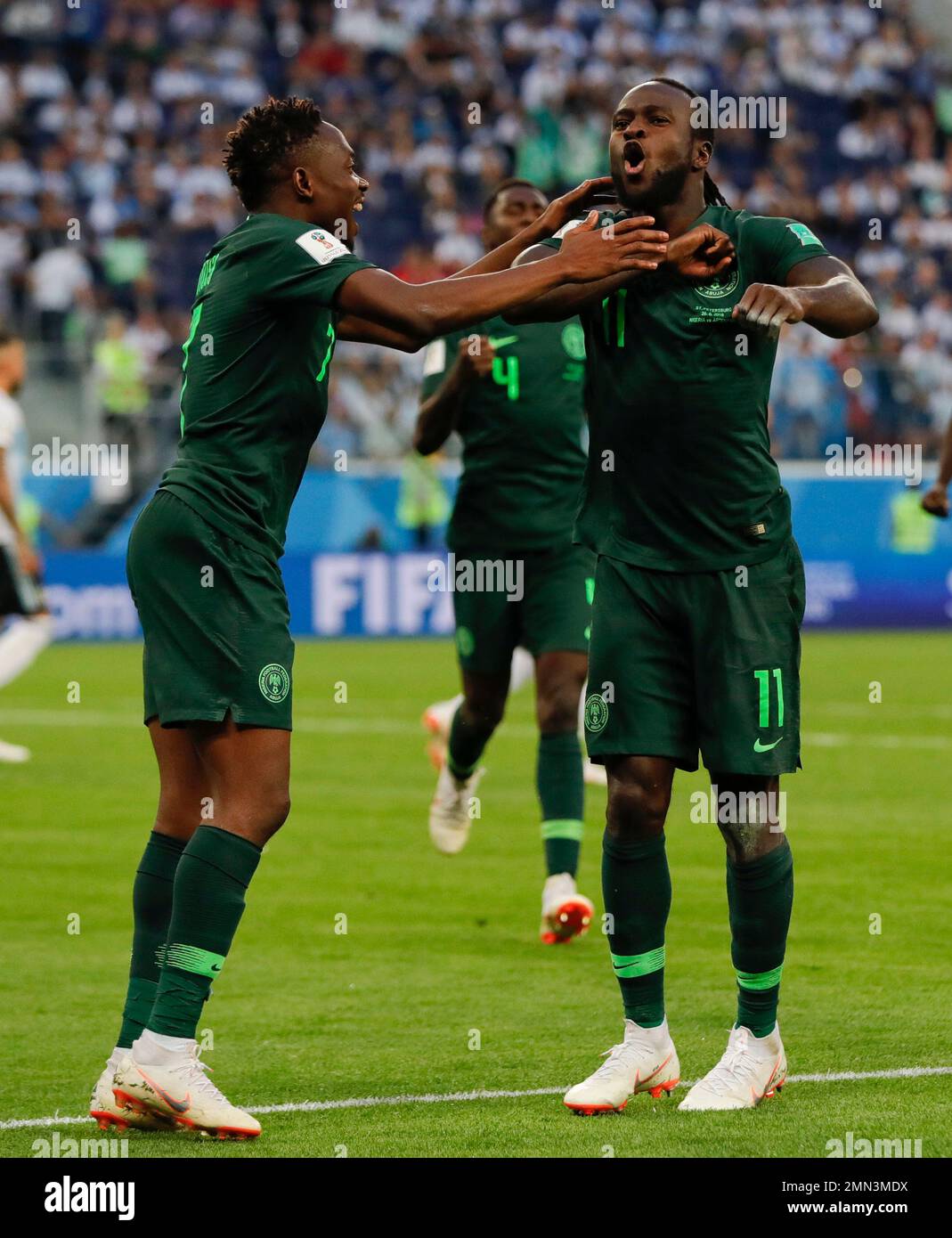 Nigeria's Victor Moses, right, celebrates with his teammate Ahmed Musa ...