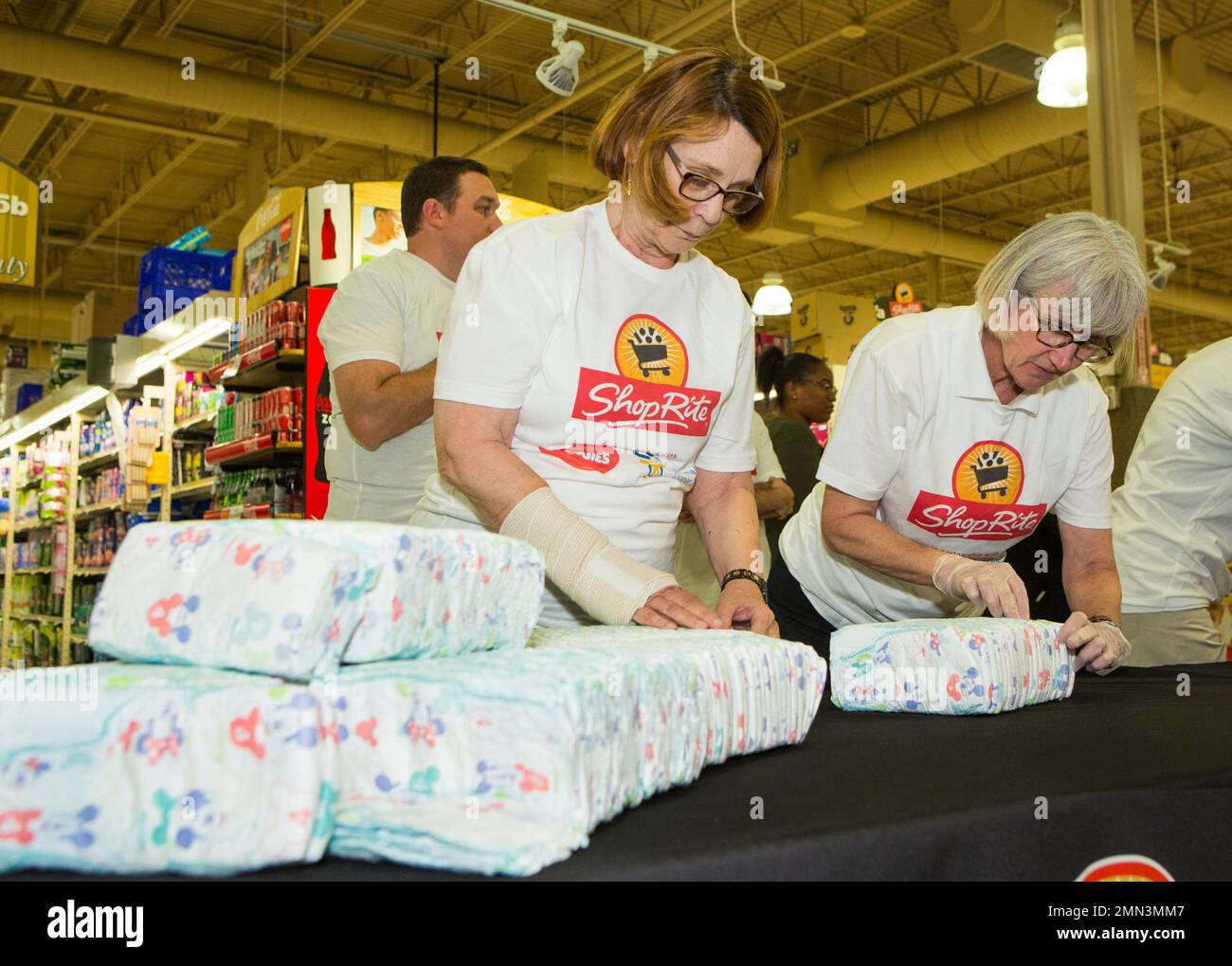 IMAGE DISTRIBUTED FOR HUGGIES - Pat Kennedy, right, of the Greater ...