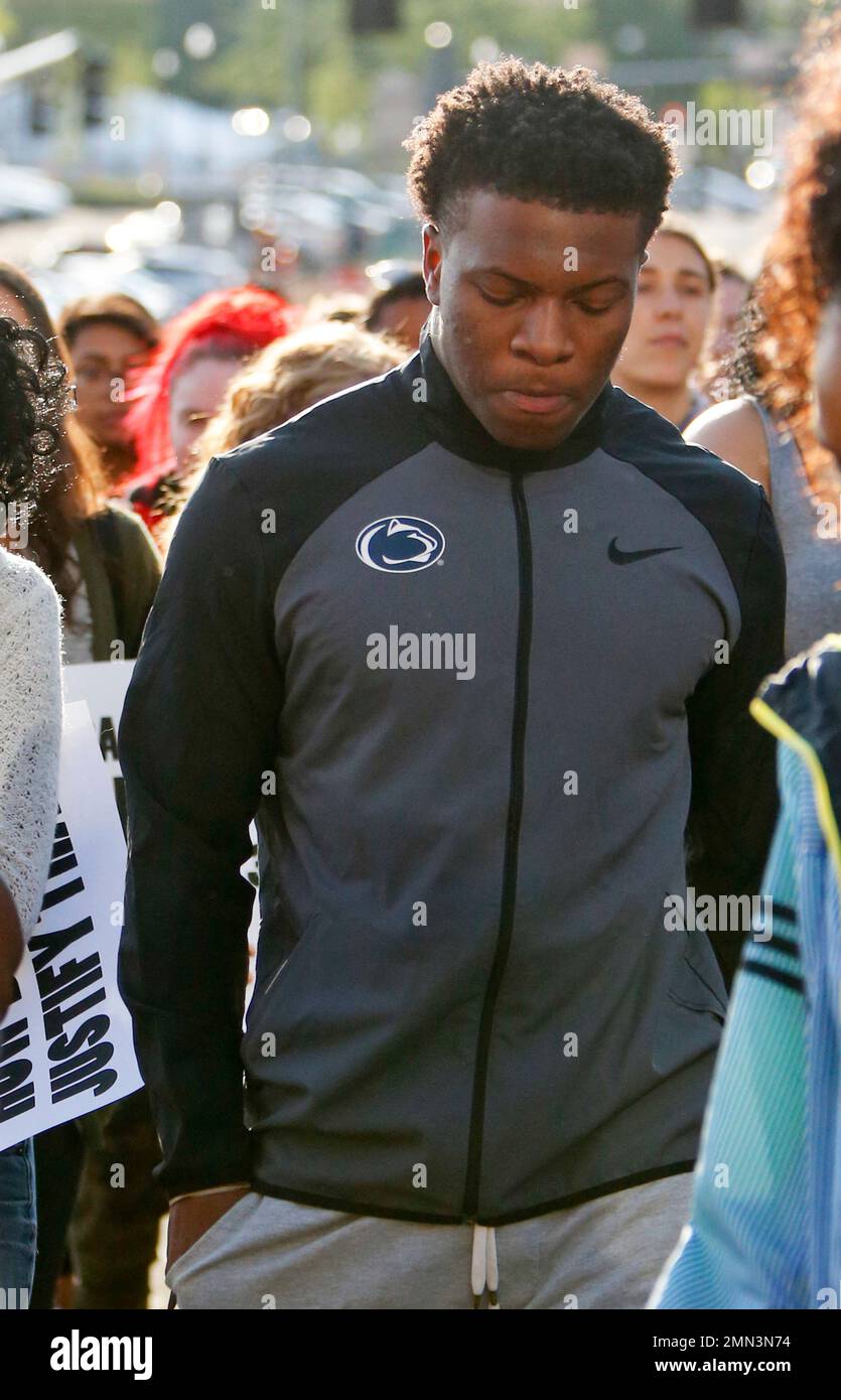 Penn State football player LaMont Wade marches in the protest of the ...