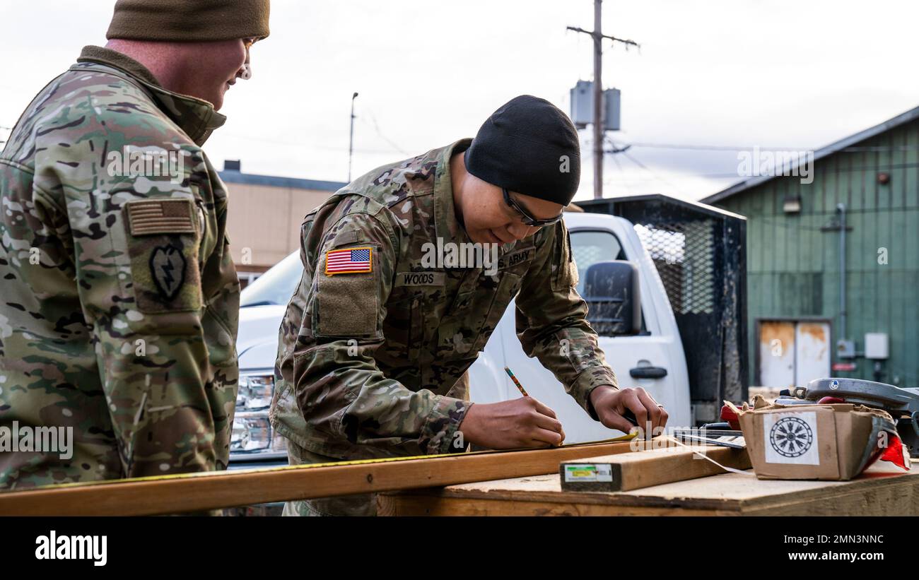 Alaska Army National Guard Sgt. Dempsey Woods, right, and Staff Sgt ...
