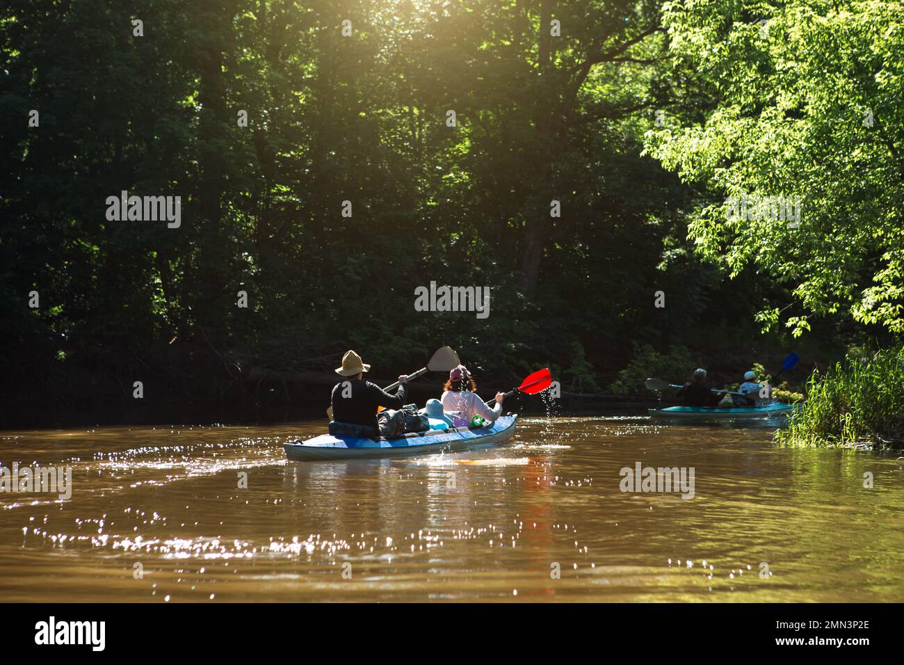 Family kayak trip. Man and woman and elderly couple senior and seniora ...
