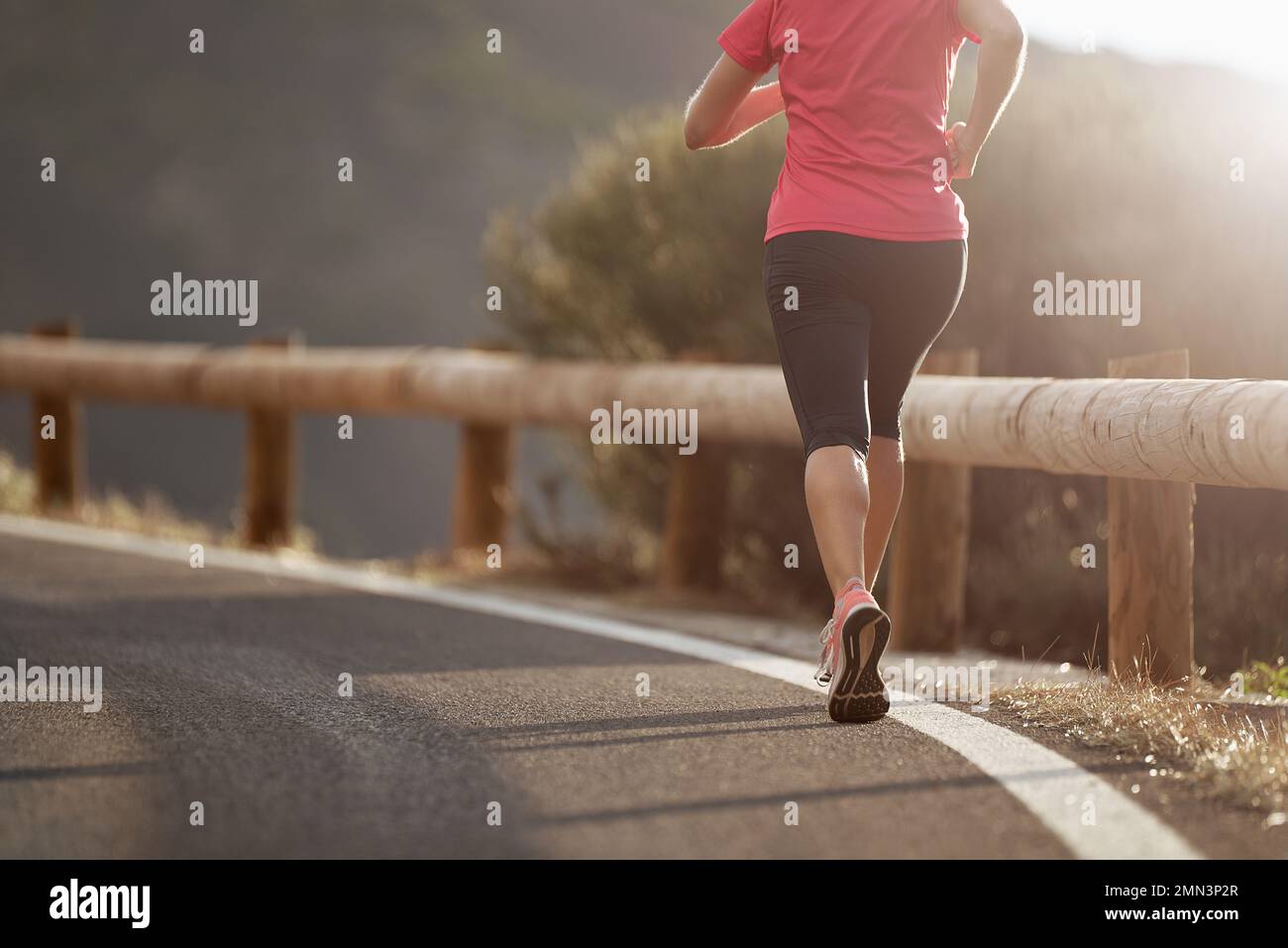 Fitness woman runner athlete running at road, working out cardio on ...