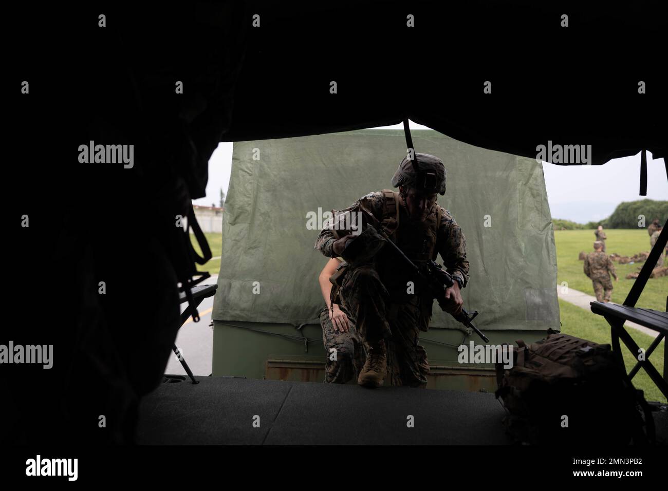 U.S. Marines with 3d Marine Division prepare to depart Okinawa, Japan ...