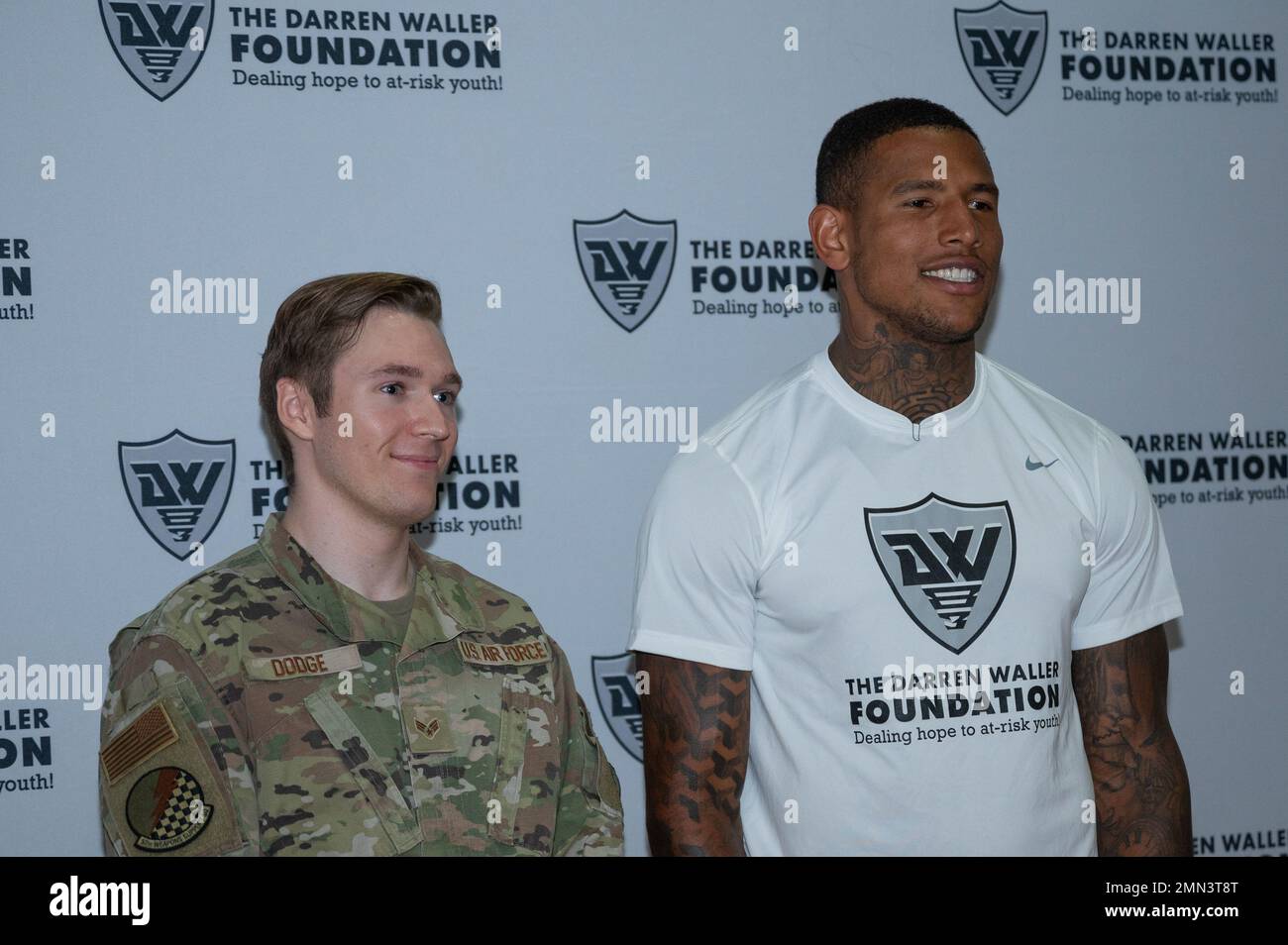 Las Vegas Raiders’ tight end Darren Waller and Senior Airman Anthony ...