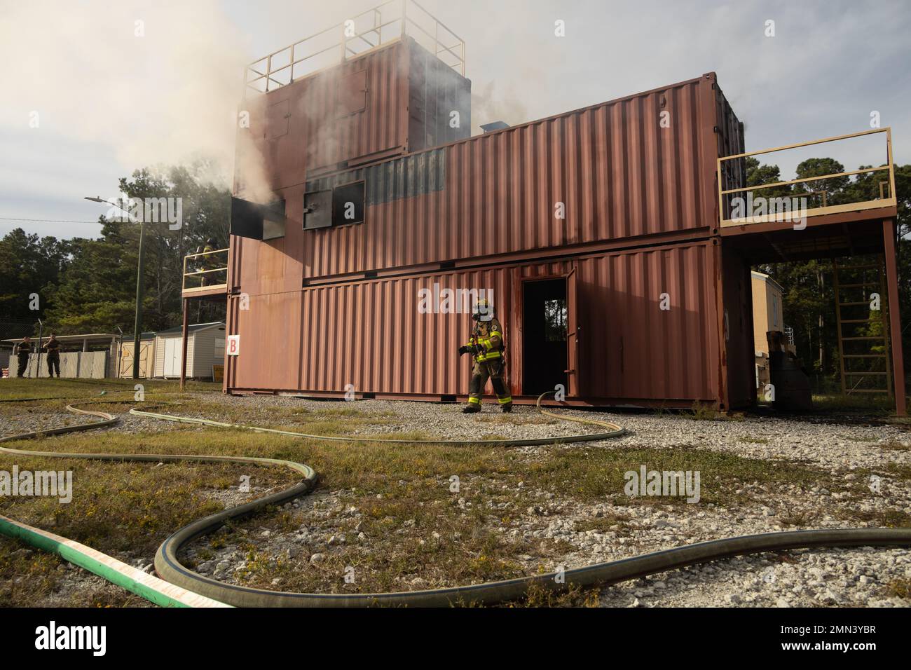 A firefighter with Camp Lejeune Fire and Emergency Services Division ...