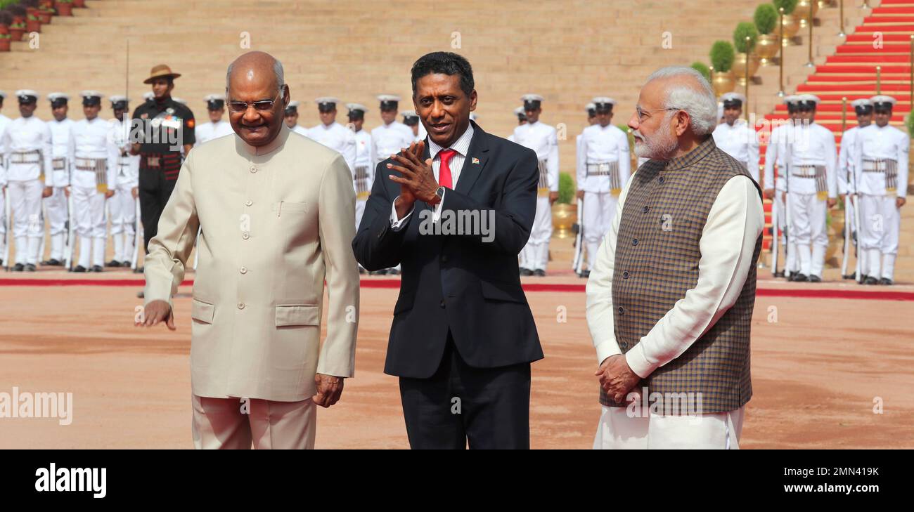 Seychelles President Danny Antoine Rollen Faure, center, talks with ...