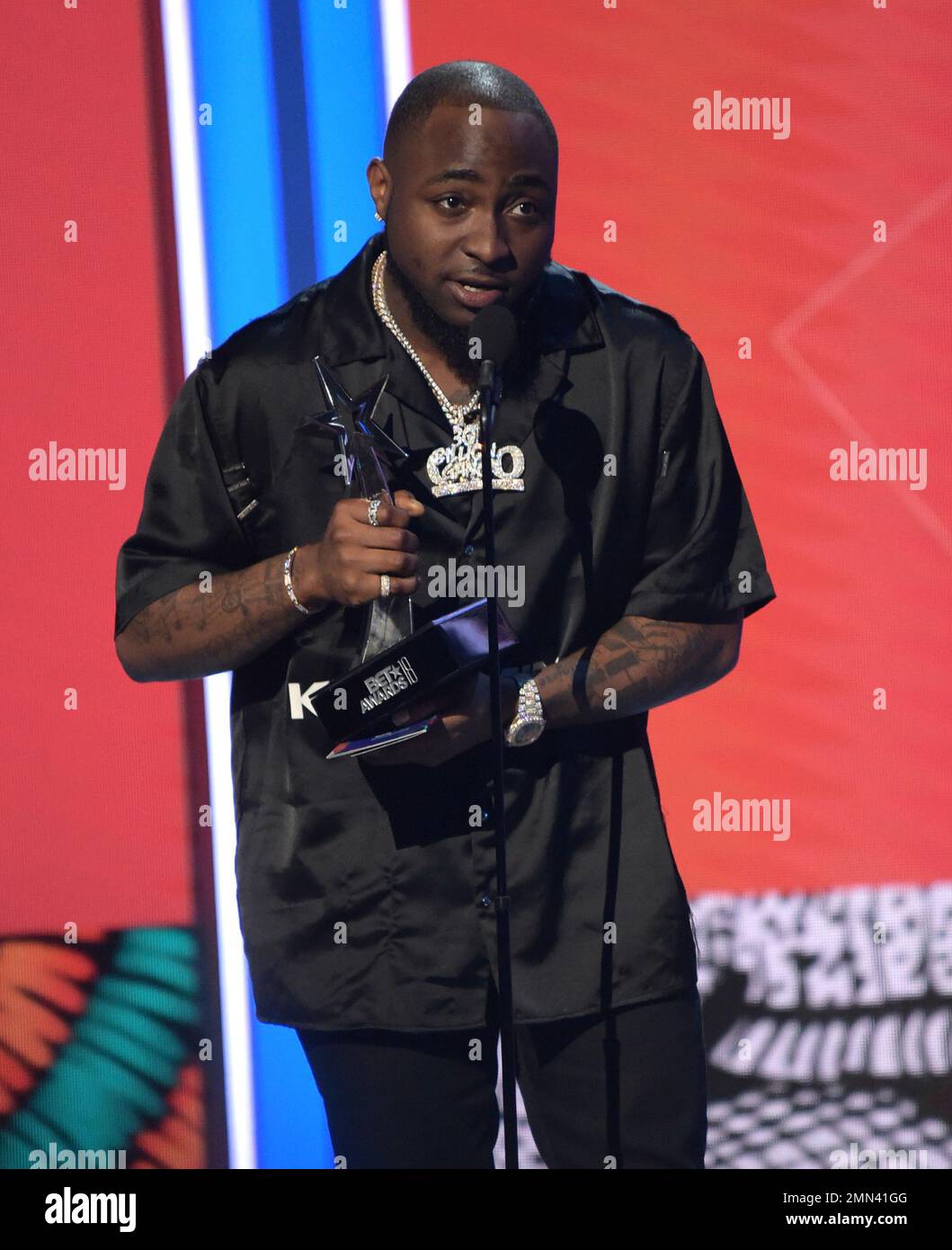 Davido accepts best international act award at the BET Awards at the ...